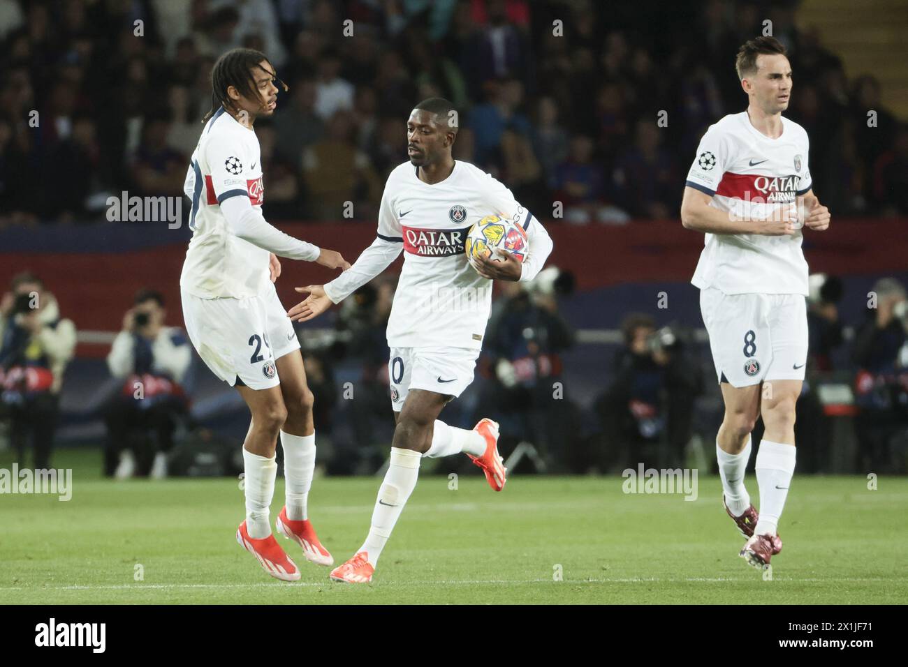 Ousmane Dembele of PSG celebrates his goal with Bradley Barcola of PSG ...