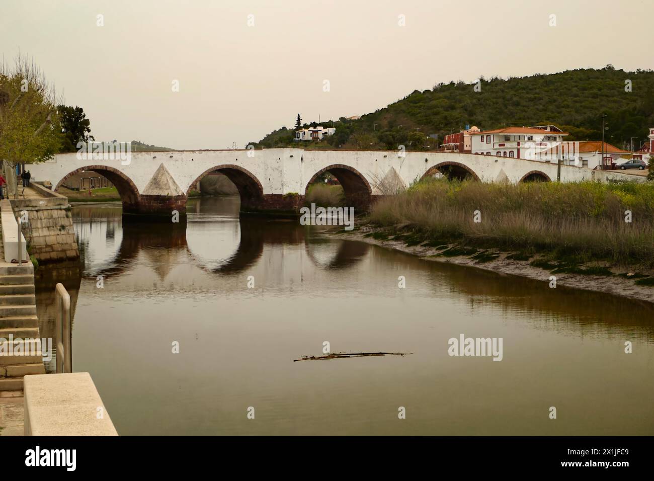 ancient Roman bridge crosses the Arade river, Slives,Algarve, Portugal ...