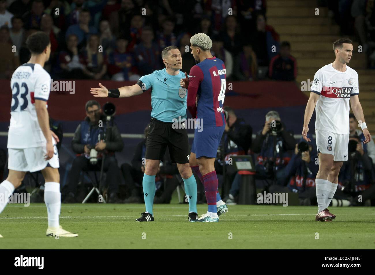 Ronald Araujo of Barcelona receives a red card from referee Istvan ...