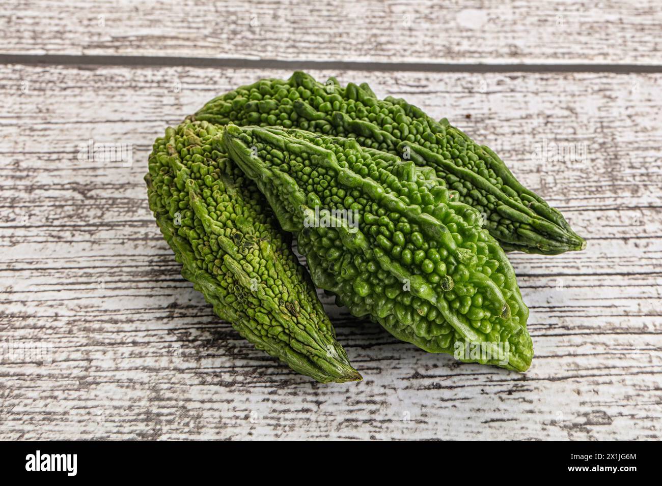 Green raw bitter lemon vegetables heap Stock Photo - Alamy