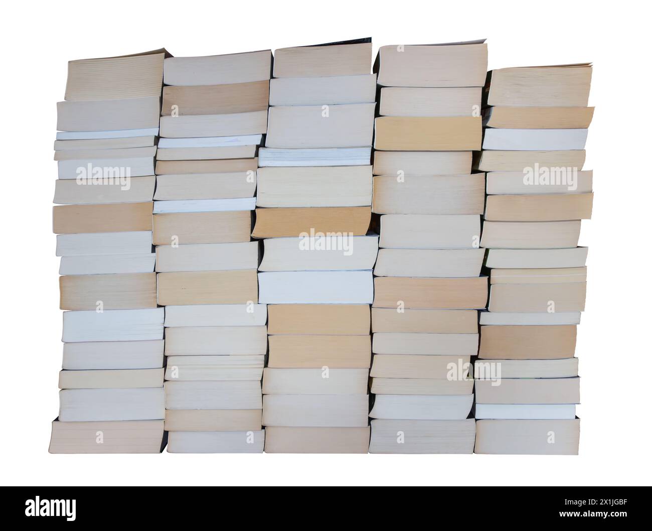 Wall of books, many stacks of books isolated on white background with ...