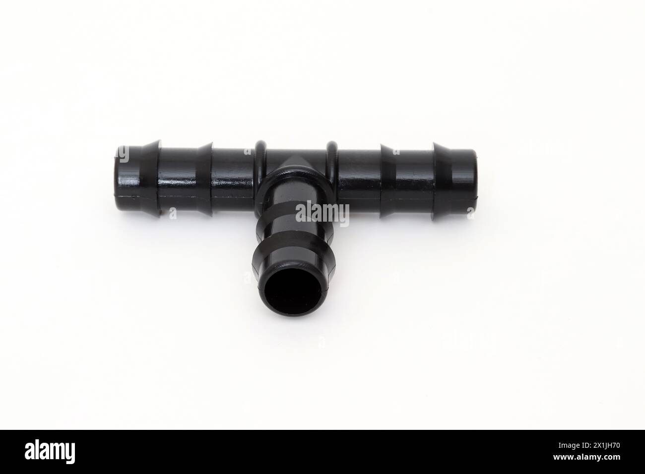 drip irrigation plastic connection attachment Stock Photo - Alamy