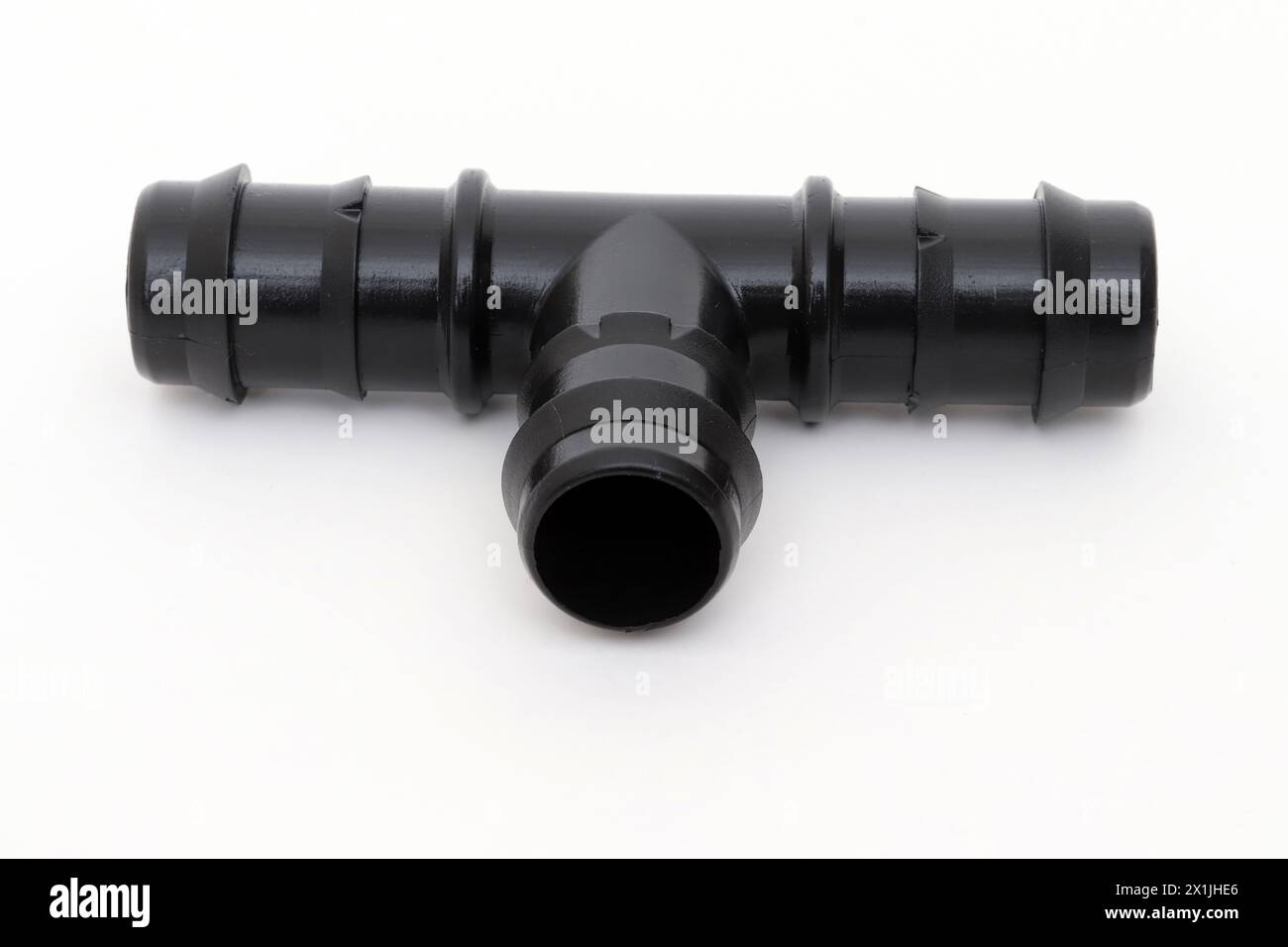drip irrigation plastic connection attachment Stock Photo - Alamy