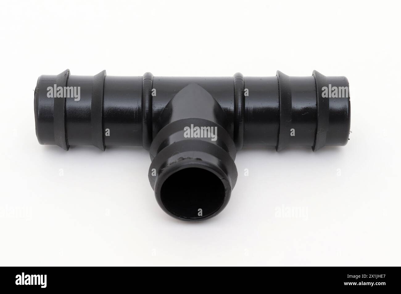 drip irrigation plastic connection attachment Stock Photo - Alamy