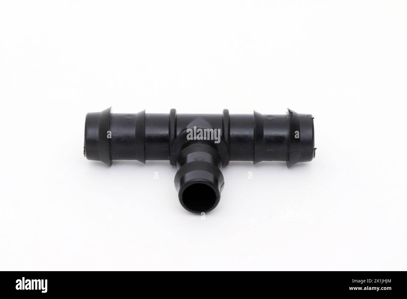 drip irrigation plastic connection attachment Stock Photo - Alamy
