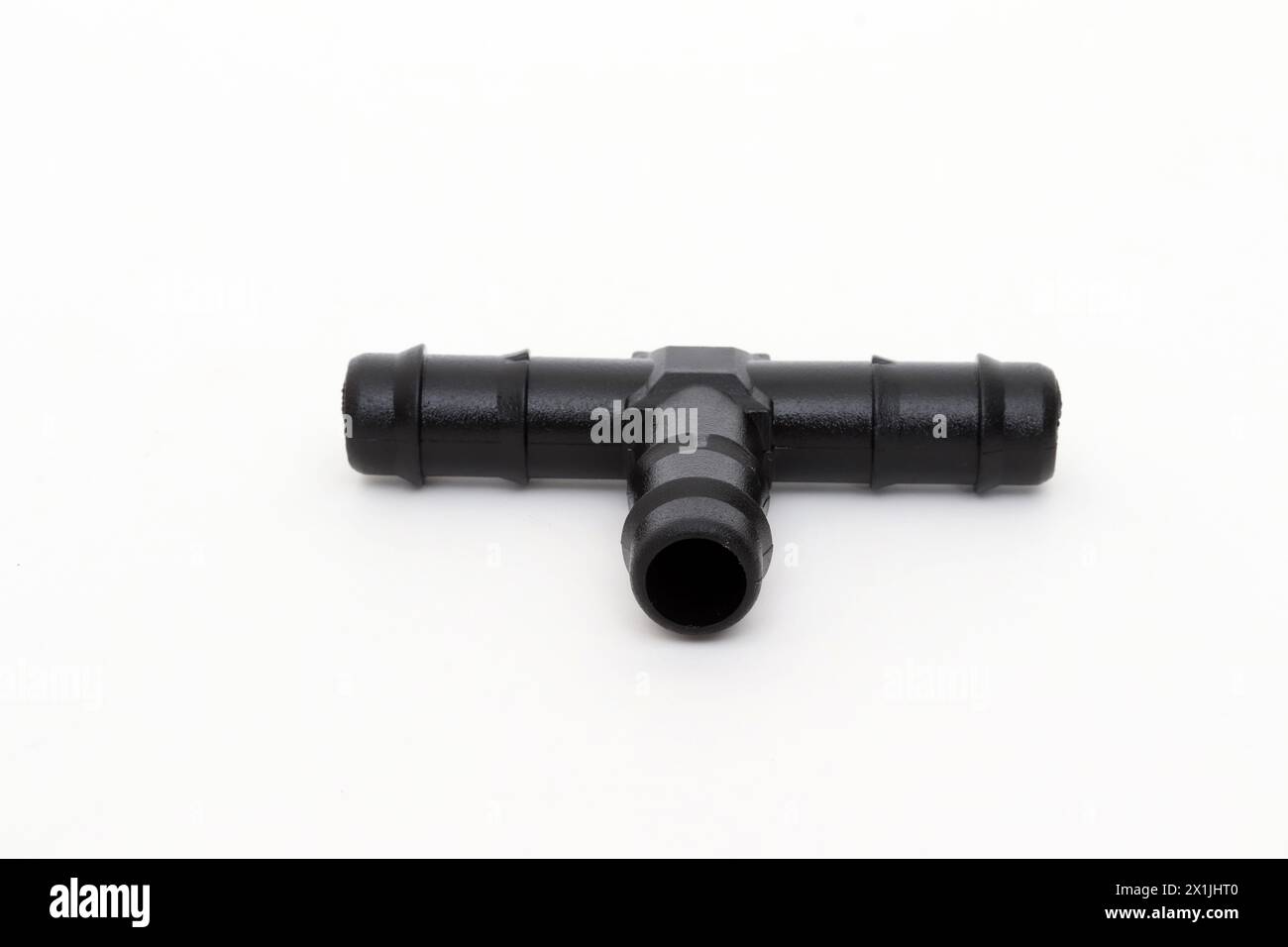 drip irrigation plastic connection attachment Stock Photo - Alamy