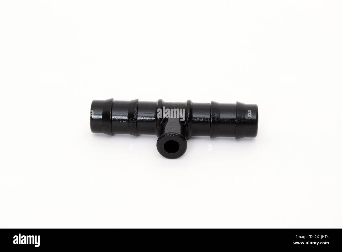 drip irrigation plastic connection attachment Stock Photo - Alamy