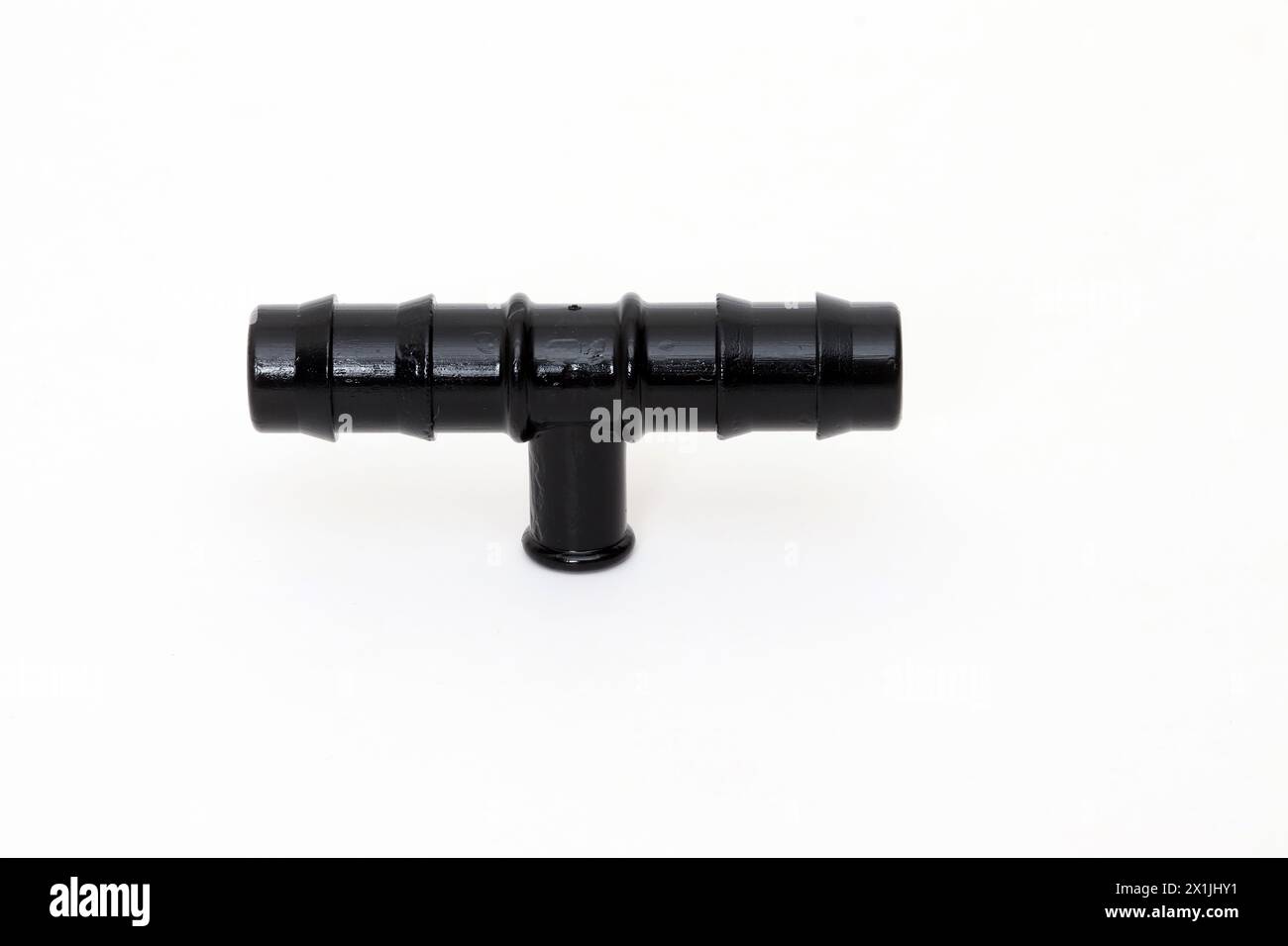 drip irrigation plastic connection attachment Stock Photo - Alamy