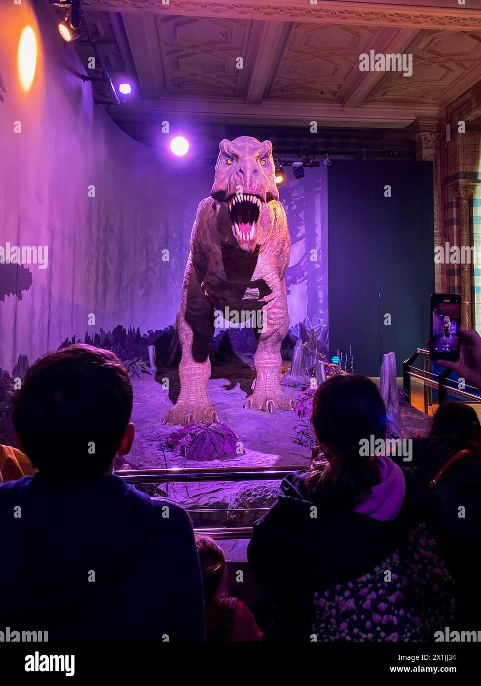 A T-Rex simulation is seen inside the Natural History Museum in London ...