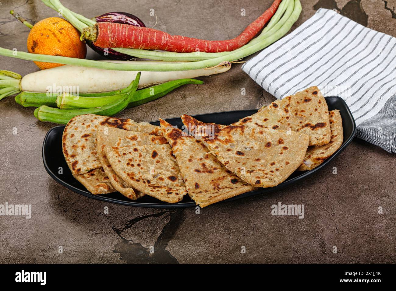 Indian vegetarian Aloo Paratha - bread with potato Stock Photo - Alamy