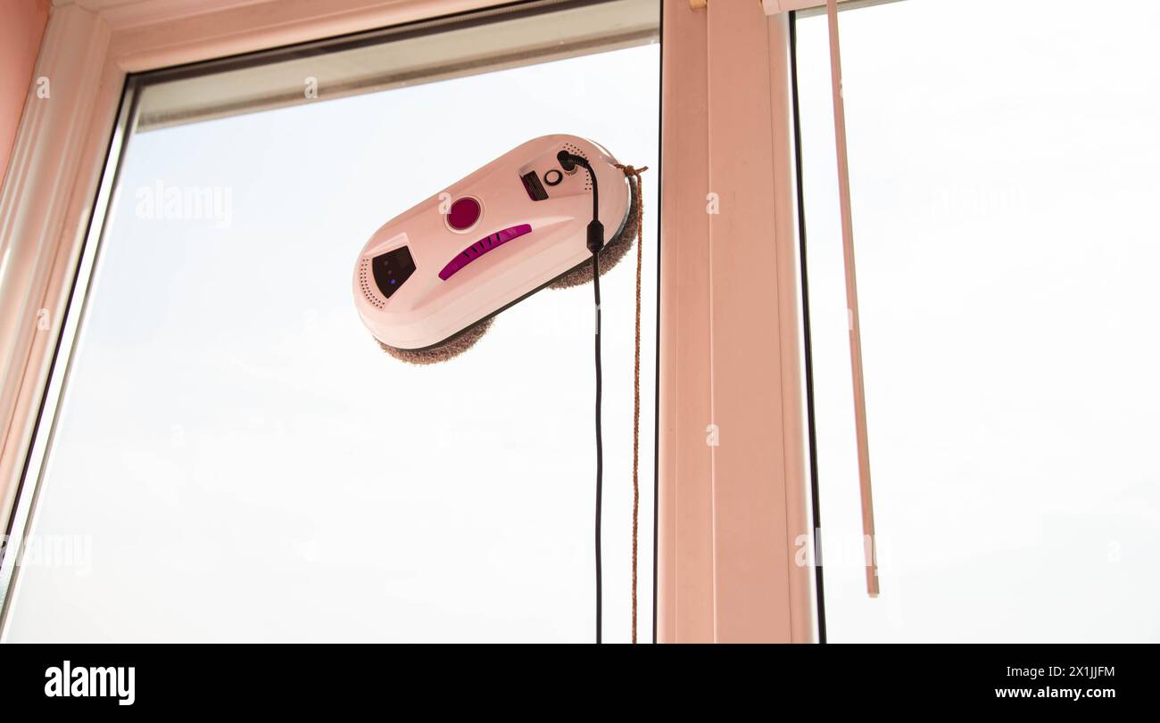 Vacuum glass washer robot washes pvc frame, modern device Stock Photo ...