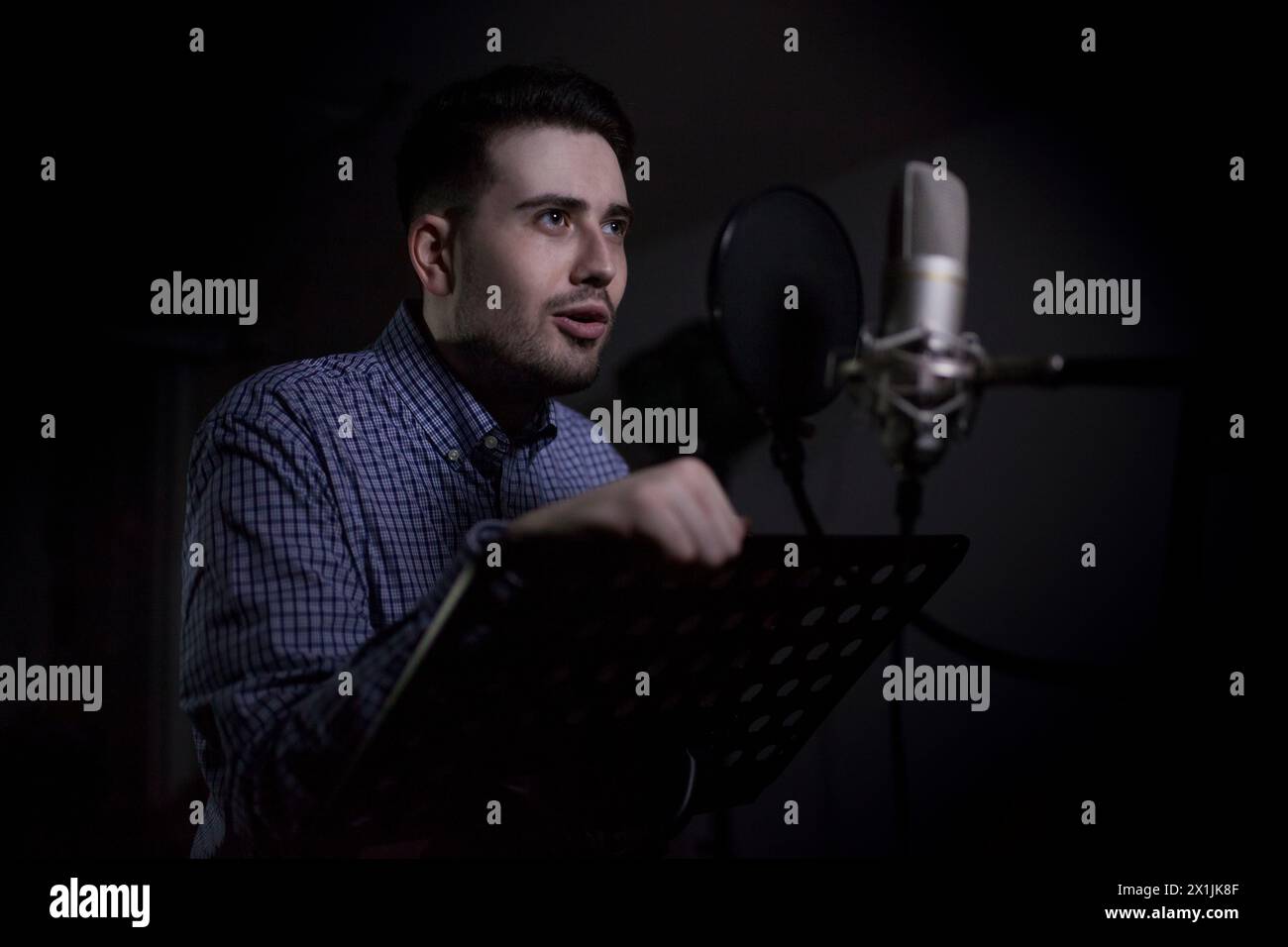 male dub actor performing in dubbing room Stock Photo - Alamy