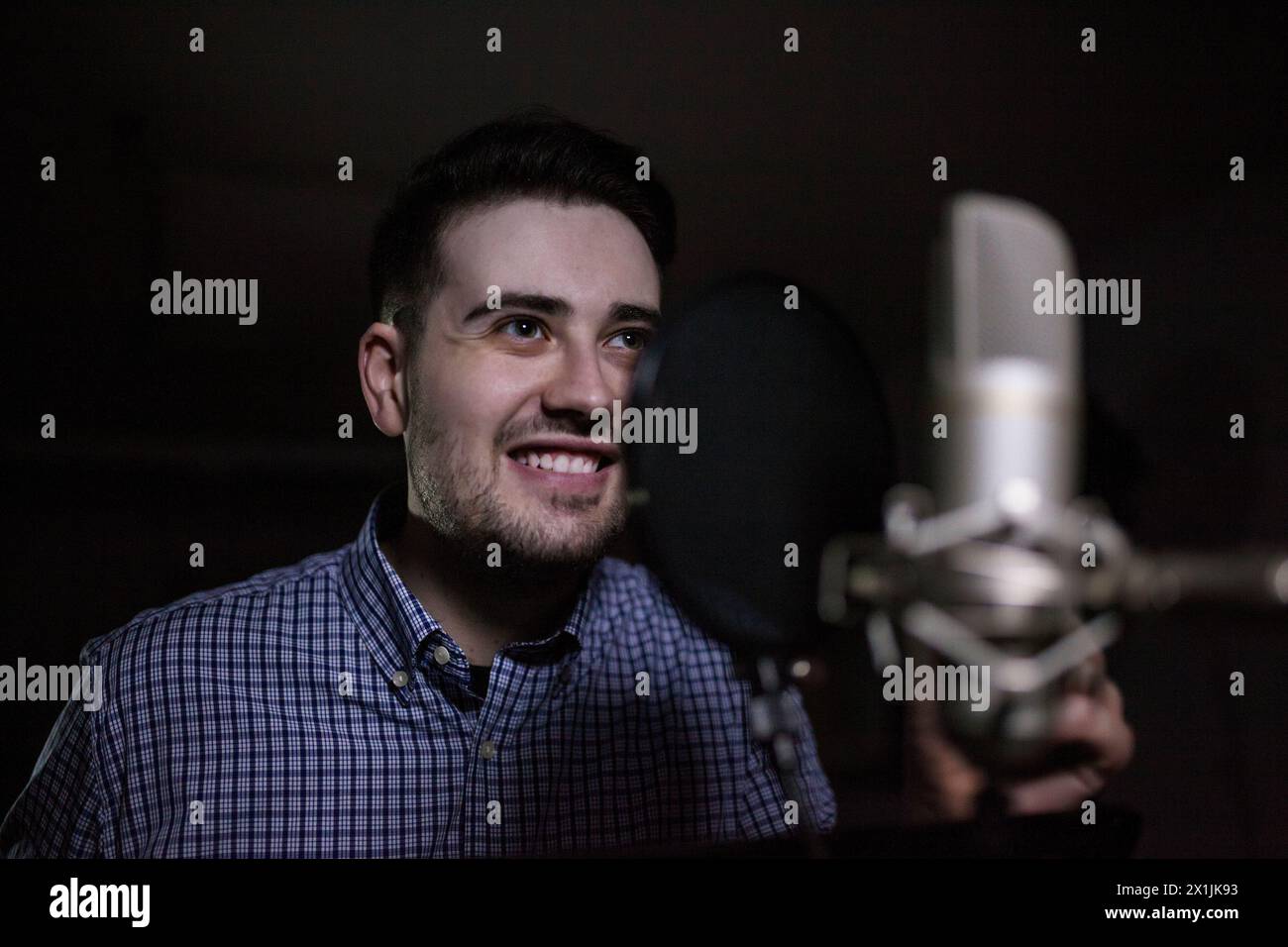 male dub actor performing in dubbing room and smile Stock Photo - Alamy