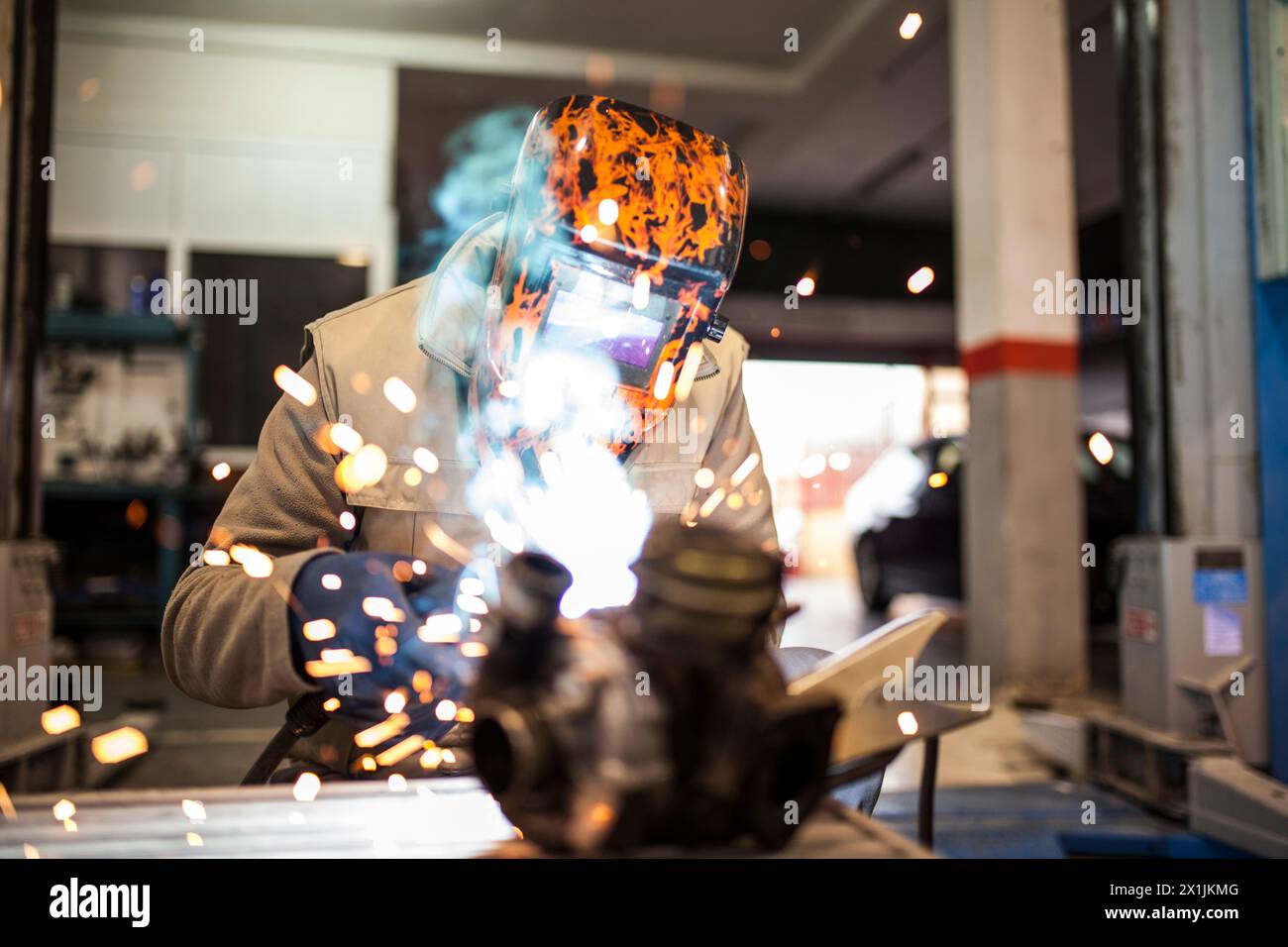 Mechanical welding with mask Stock Photo - Alamy