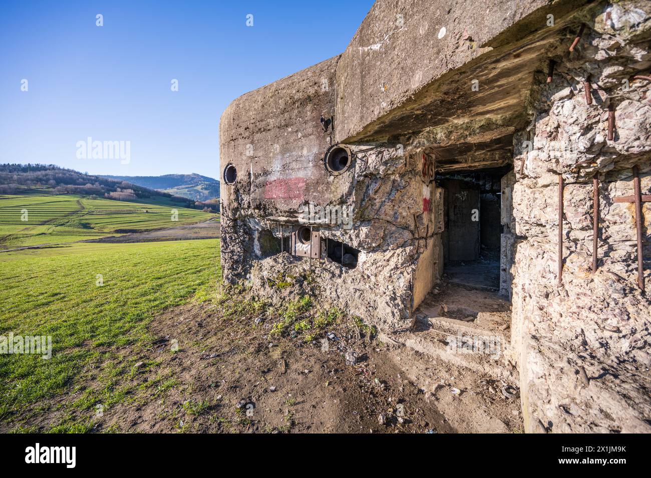 Entrance to the old destroyed World war ii bunker. Damaged reinforced ...