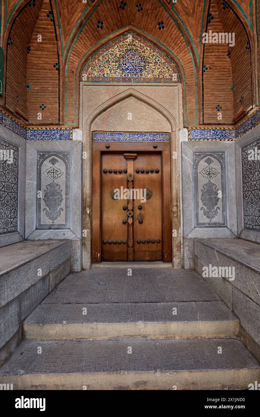 Closed front door of a traditional Persian house in the historic center ...
