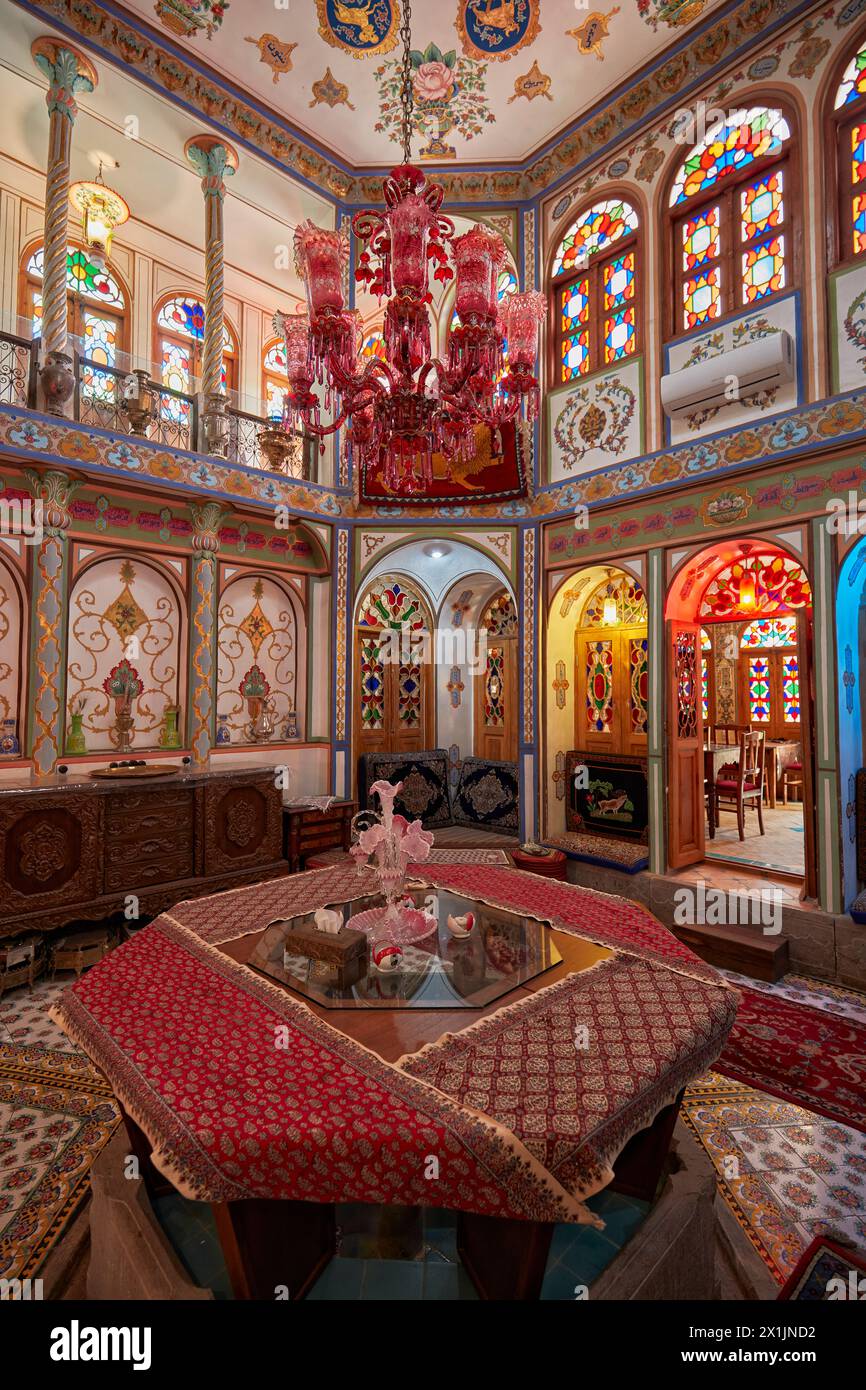 Ornate interior of a small room with stained glass windows in the ...