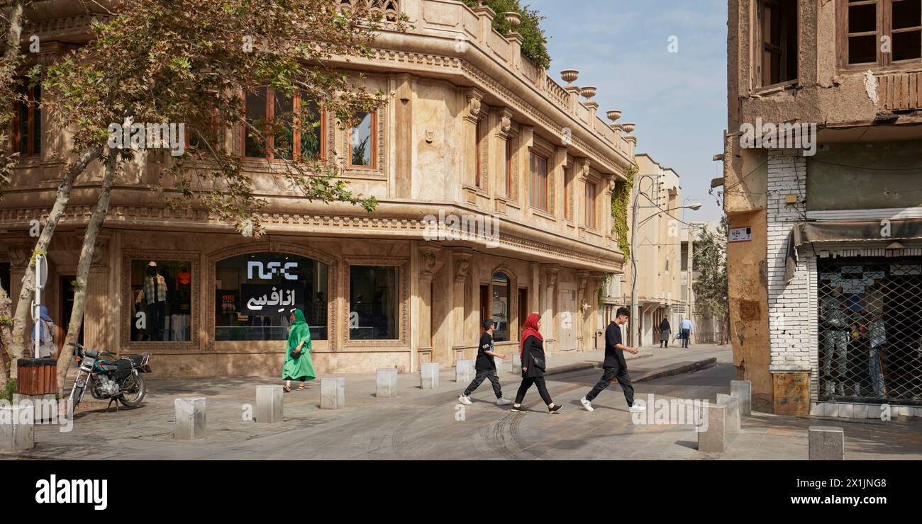 Pedestrians cross a quiet narrow street in the New Julfa, Armenian ...