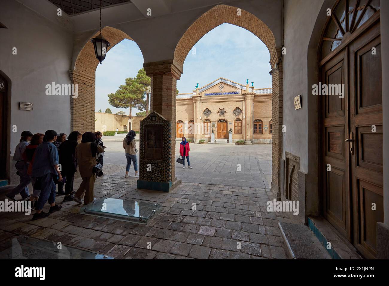 Tourists walk in the courtyard of the 17th century Holy Savior ...