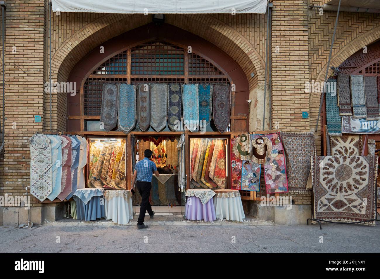 A man walks in a handicraft shop in Naqsh-e Jahan Square, UNESCO World ...