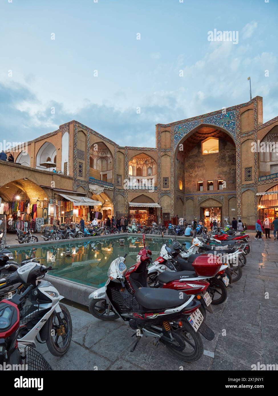 Motorbikes parked at the Qeysarie Gate, the main gateway to the Grand ...