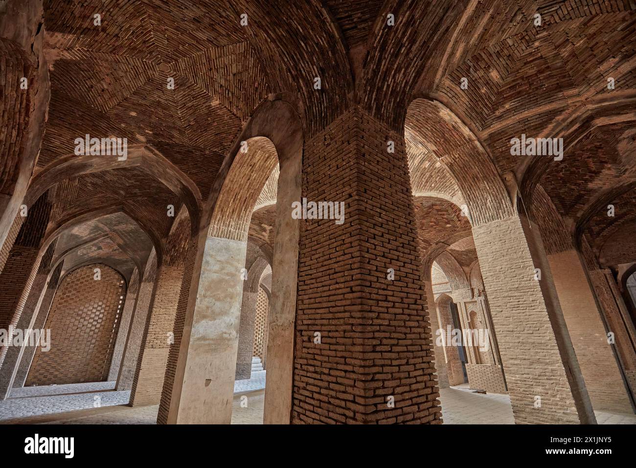 Interior view of hypostyle hall with many pillars supporting roof of brick vaults in the Jameh ...