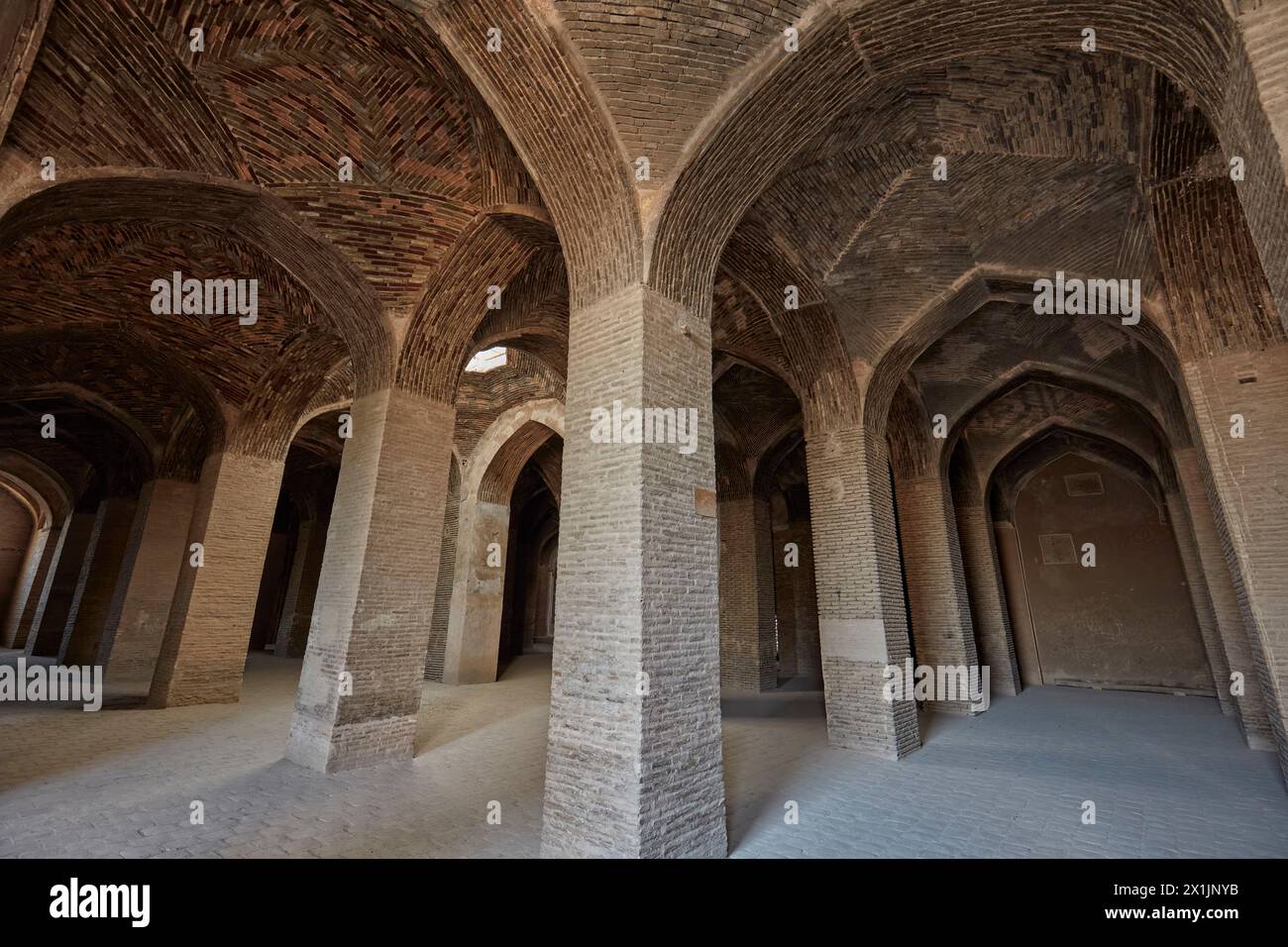 Interior view of hypostyle hall with many pillars supporting roof of brick vaults in the Jameh ...