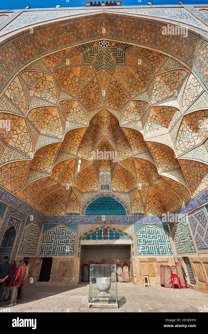 Ceiling with muqarnas vaulting covered with tiles in one of the iwans ...