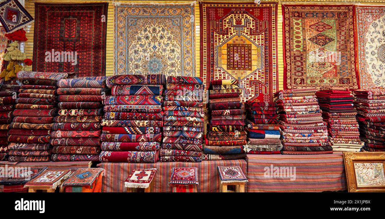 Colorful selection of handmade Persian carpets displayed in a carpet ...