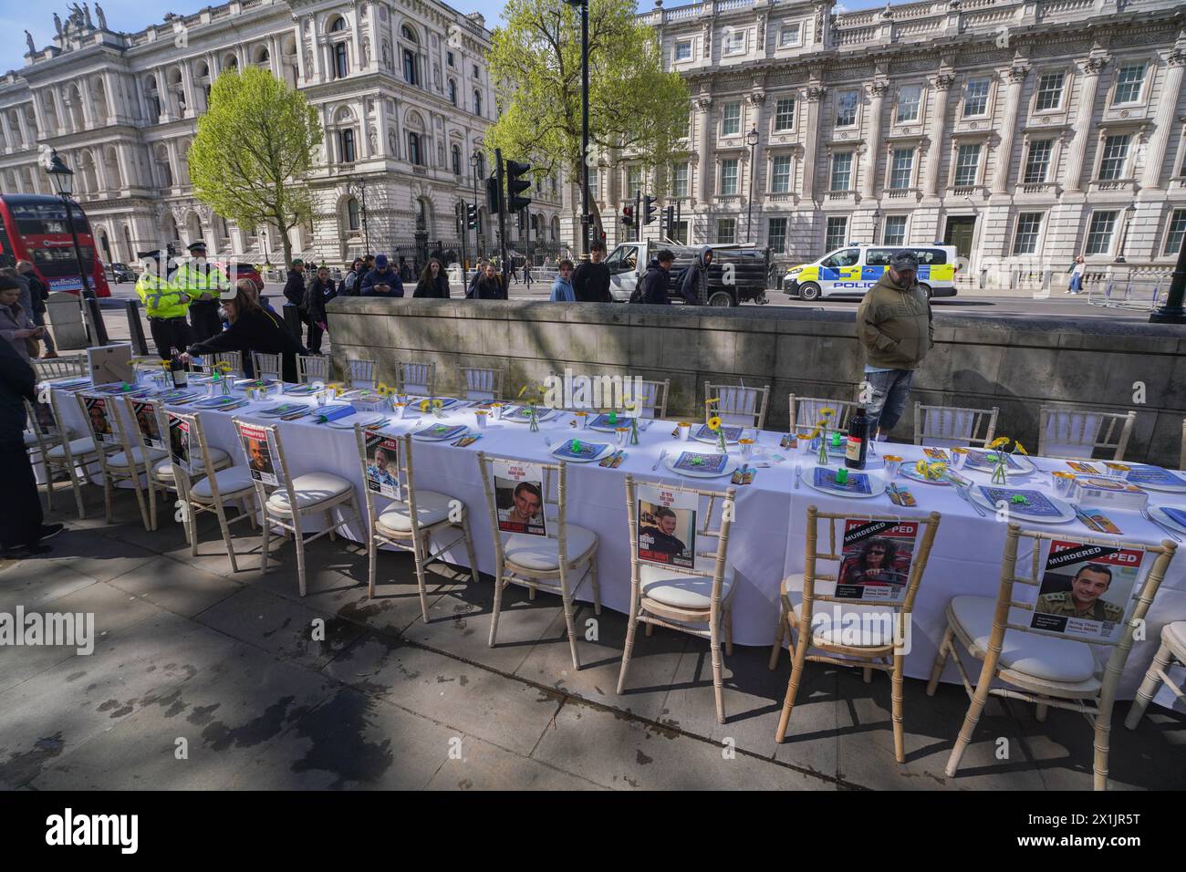 London 17 April 2024 . Empty tables are laid opposite Downing Street ...