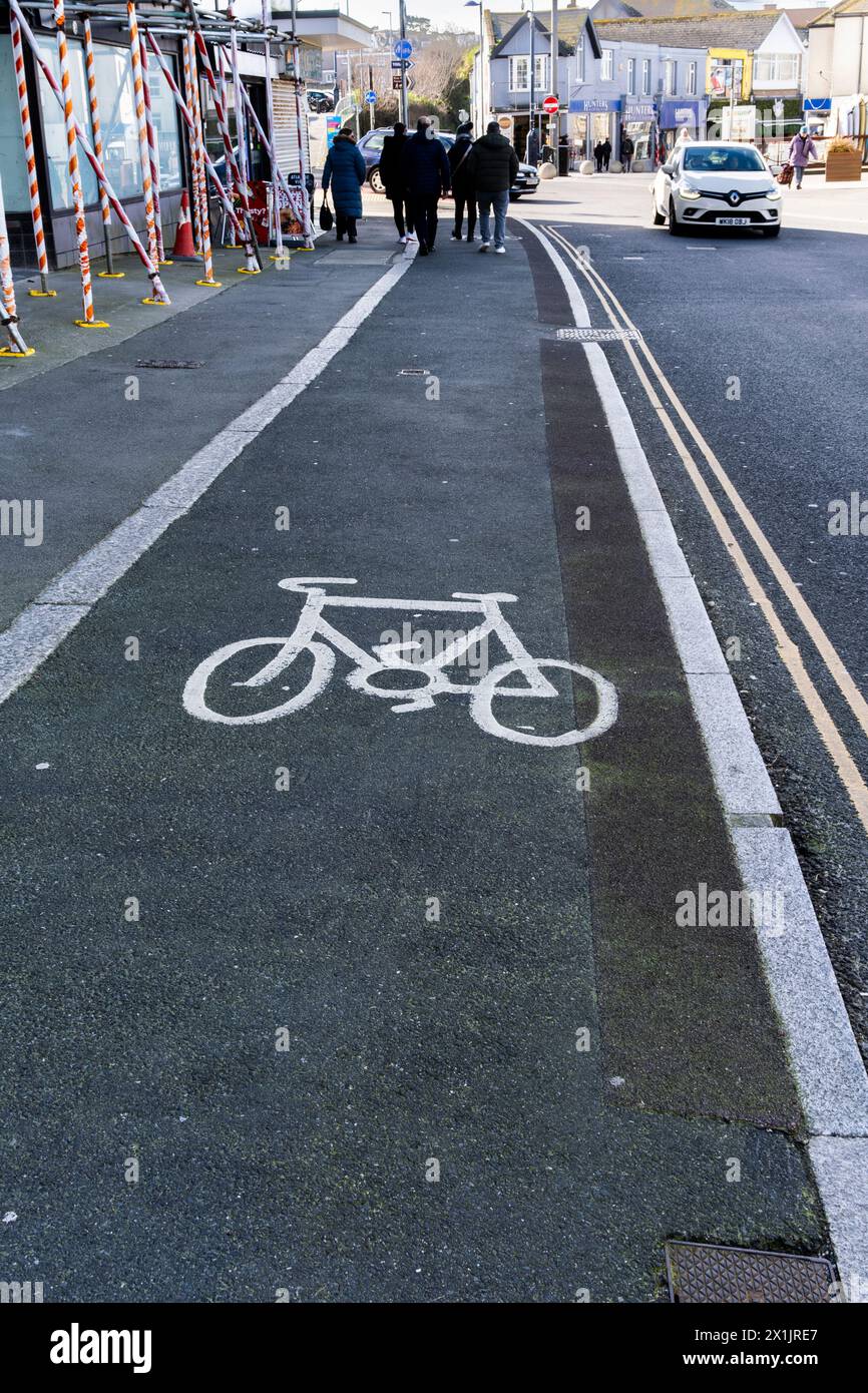 A designated cycle lane on a pavement sidewalk in Newquay town centre ...