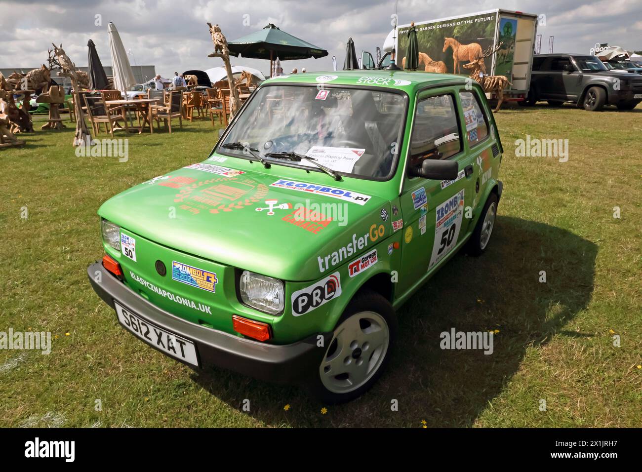 Three-quarters Front view of a Green, 1998,Polski Fiat 126p, on display ...