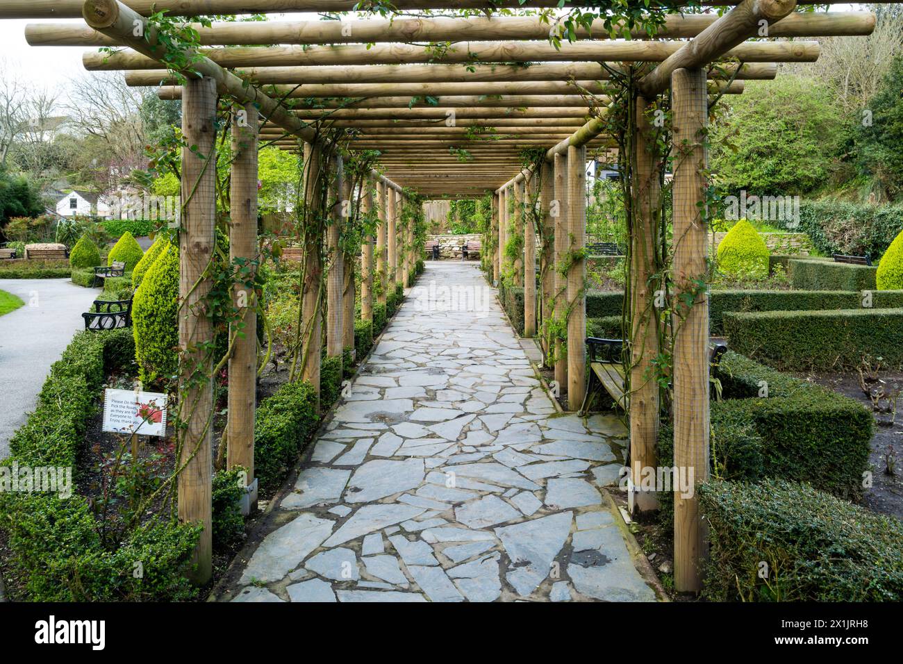 An ornamental wooden pergola in the Rose Garden in the historic award ...