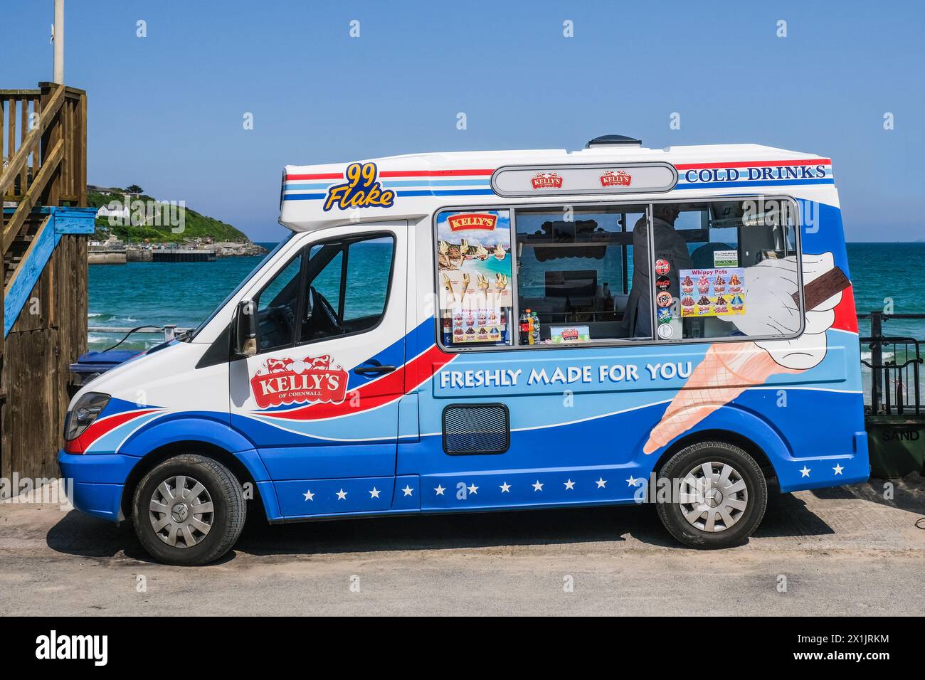 An ice cream truck vehicle van parked at Towan Beach in Newquay in ...