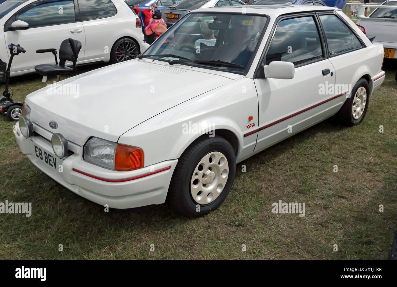 Three-quarter front view of White, 1988, Ford Escort XR3i, on display ...