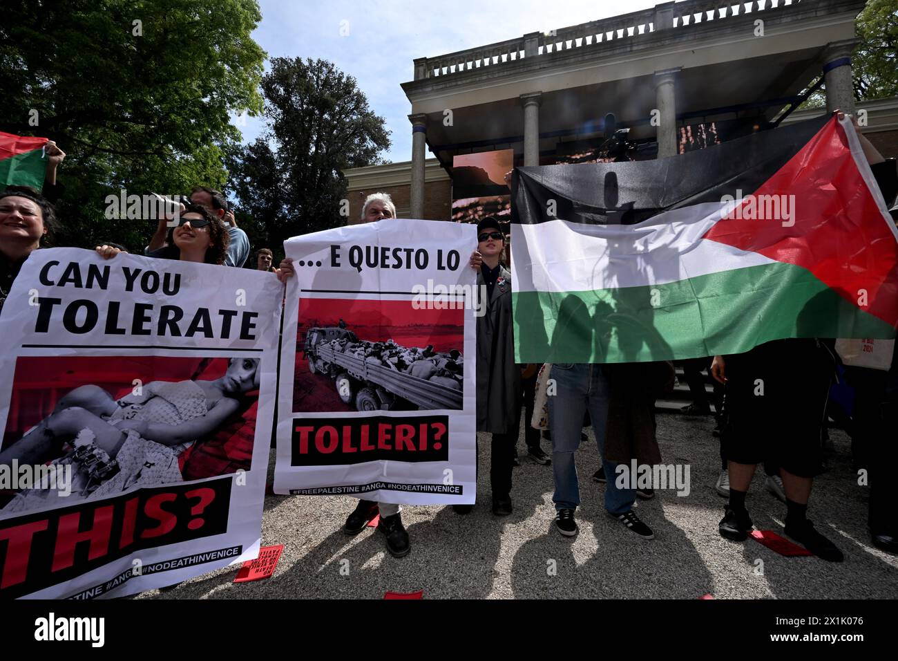 17 April 2024, Italy, Venedig: Demonstrators with Palestinian flags ...