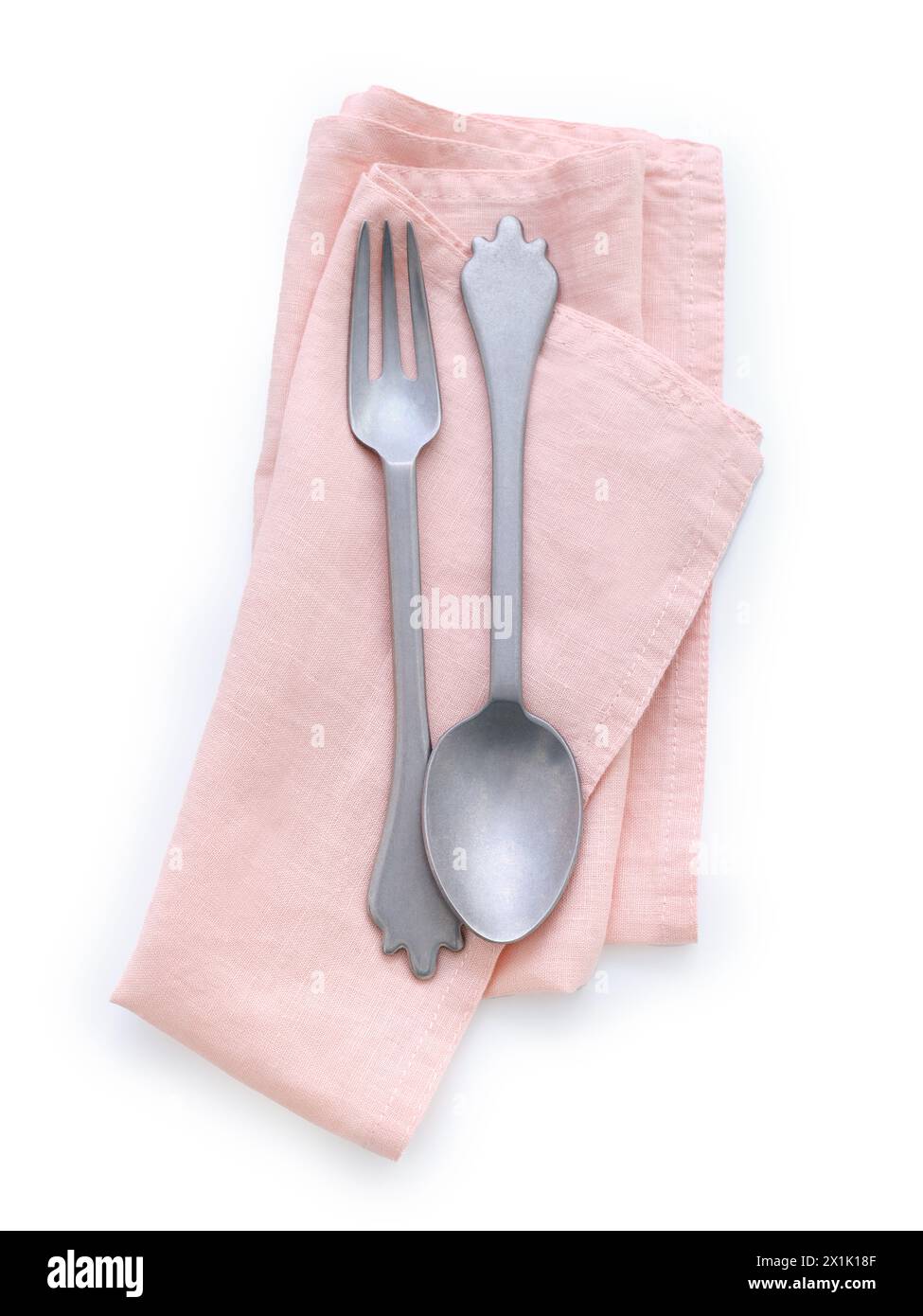 Cutlery on table surface Cut Out Stock Images & Pictures - Alamy