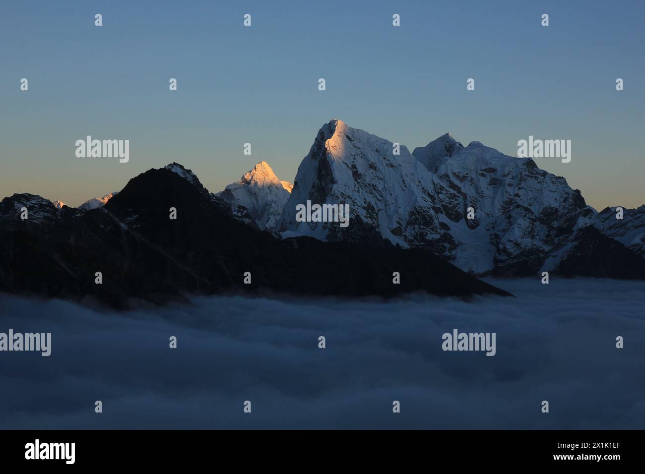 Peaks of Mount Ama Dablam and Cholatse at sunset, Nepal Stock Photo - Alamy