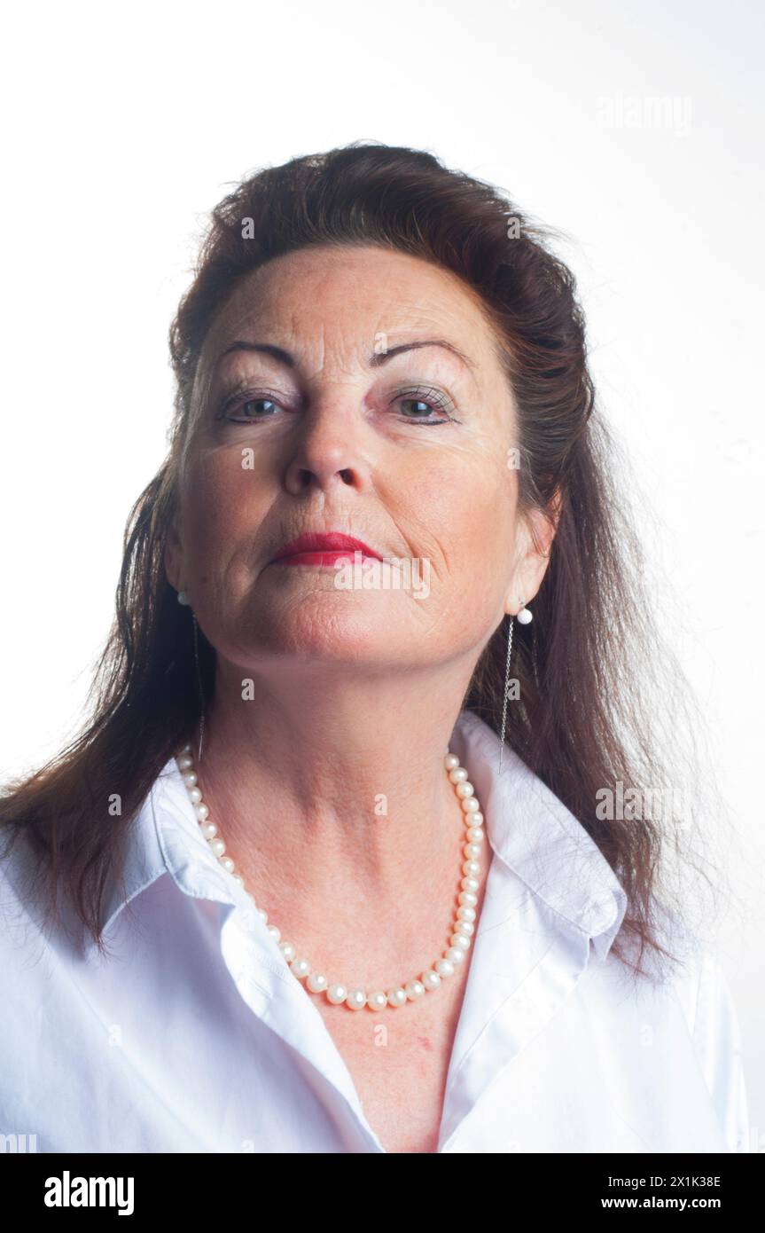 Studio shot of a strong, confident woman cut out against a white background - John Gollop Stock ...