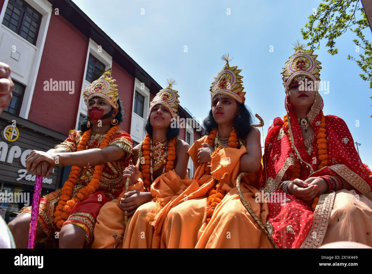 Devotees dress as Hindu deities during a religious procession to ...