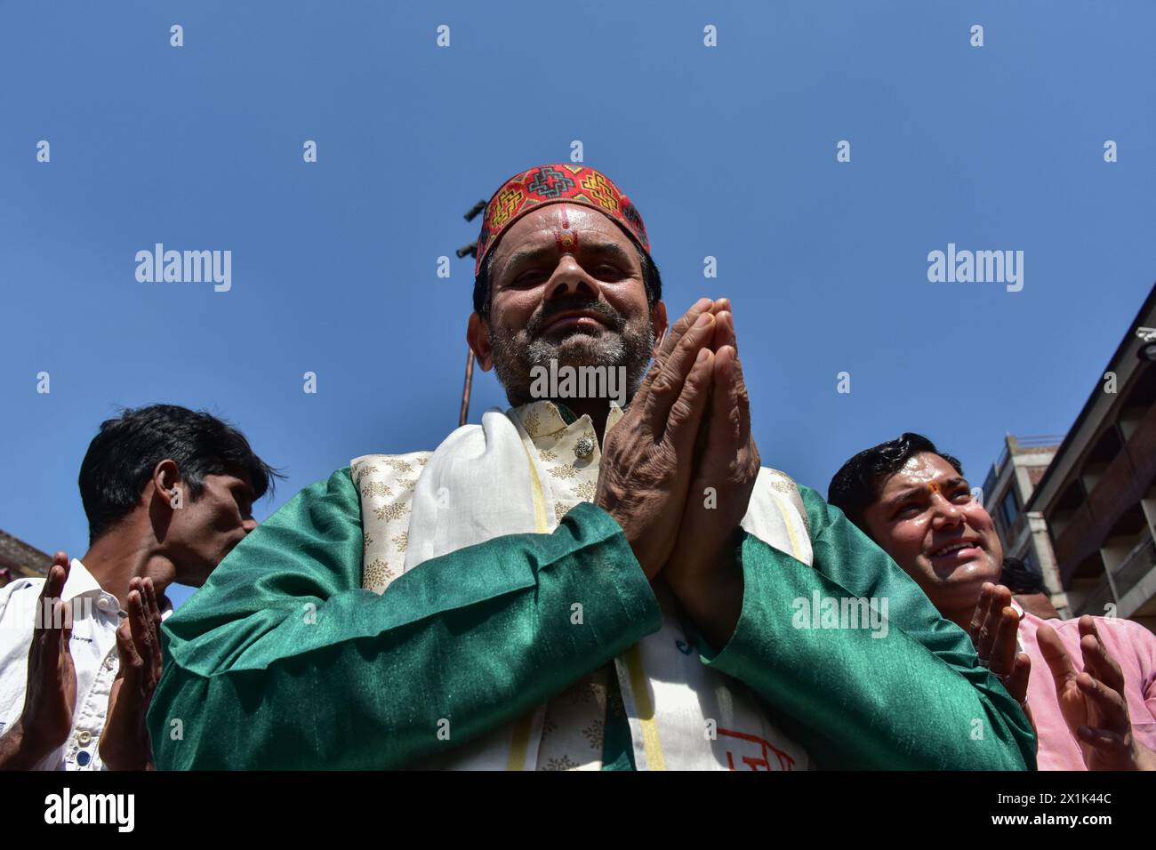 Hindu devotees perform rituals during a religious procession to ...