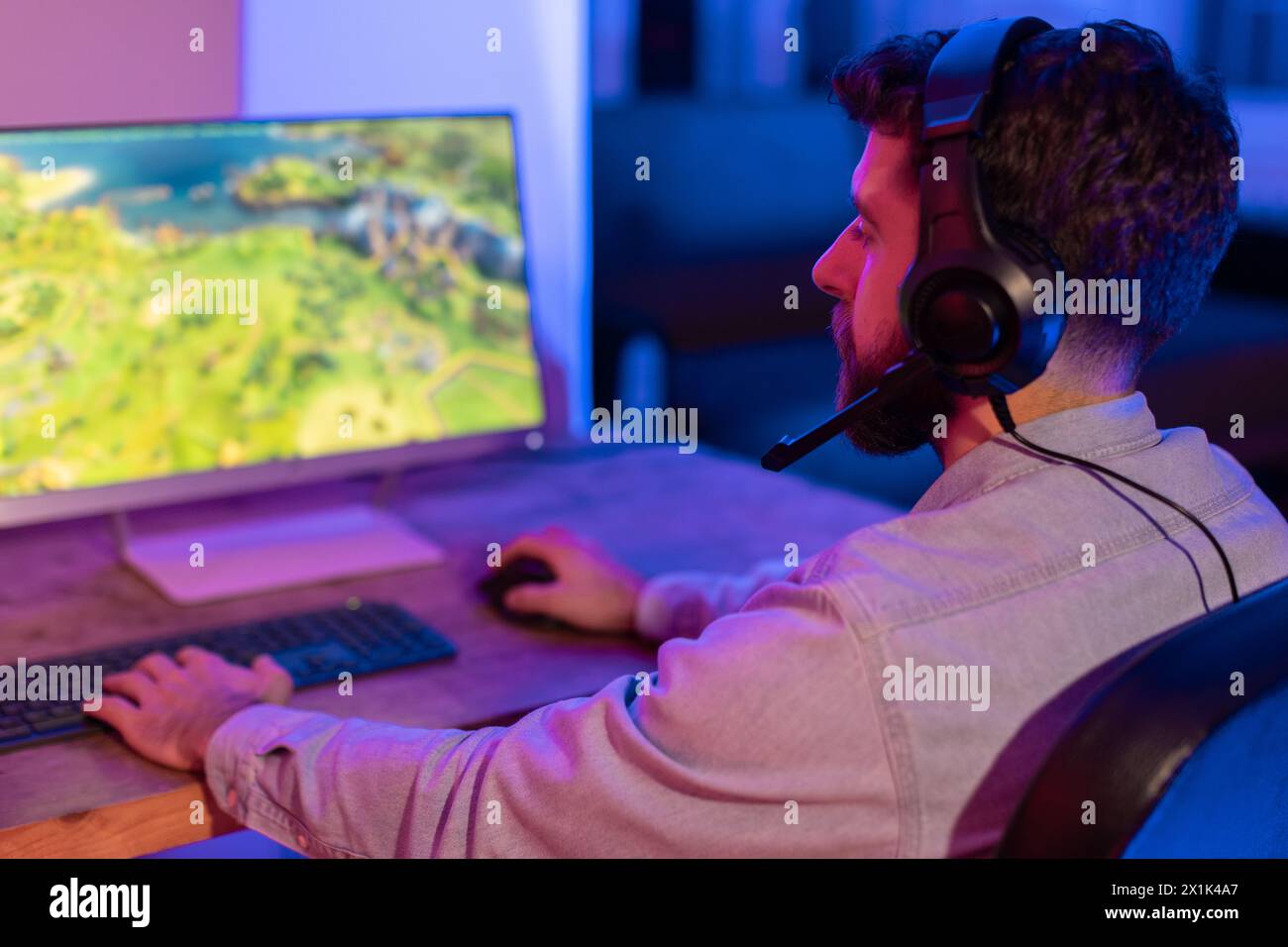 Male gamer focused internet game hi-res stock photography and images ...