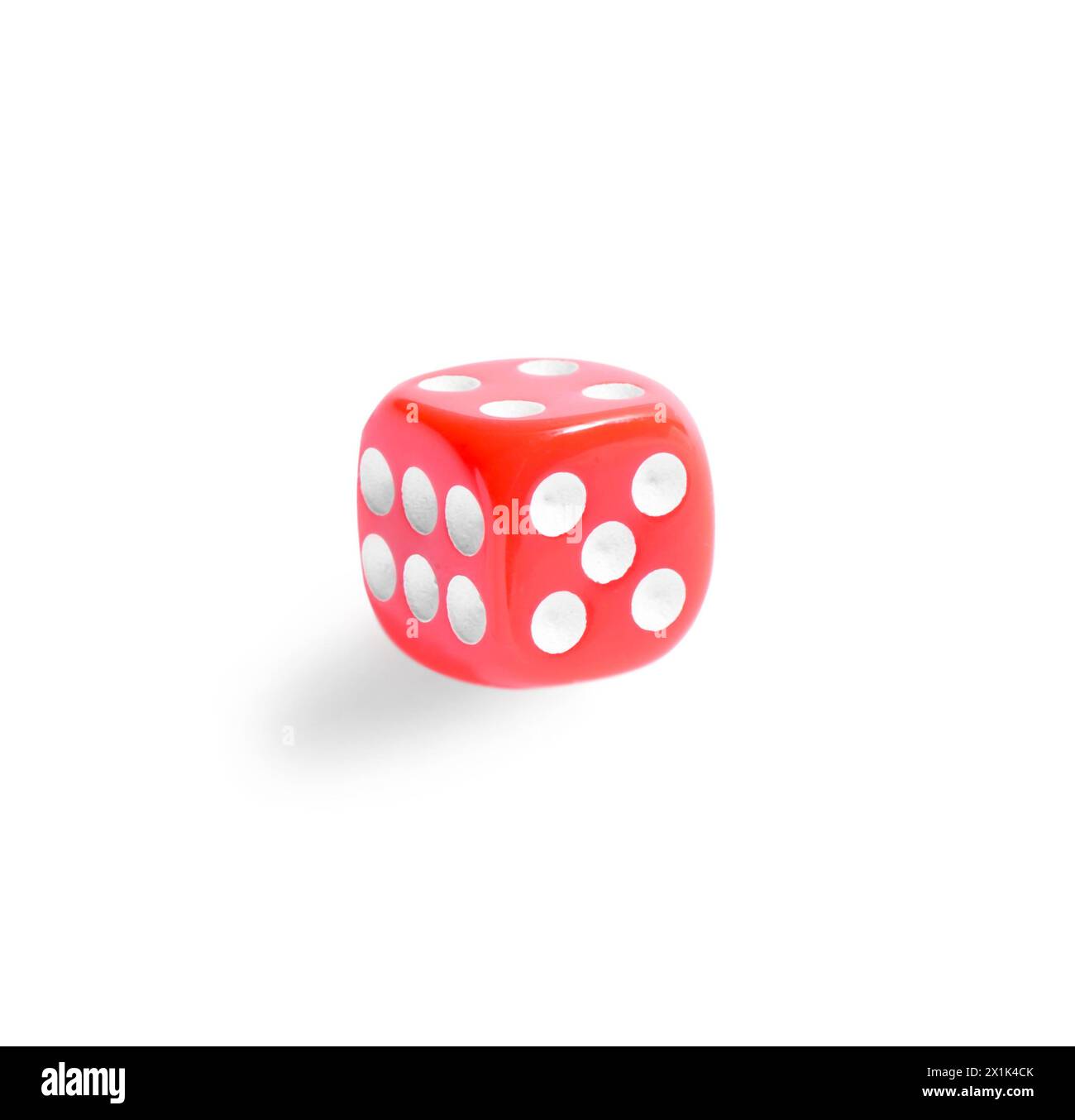 One red game dice isolated on white Stock Photo - Alamy
