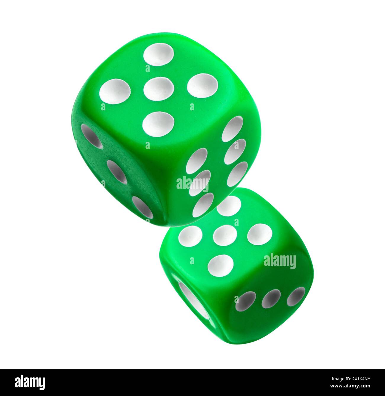 Two green dice in air on white background Stock Photo - Alamy