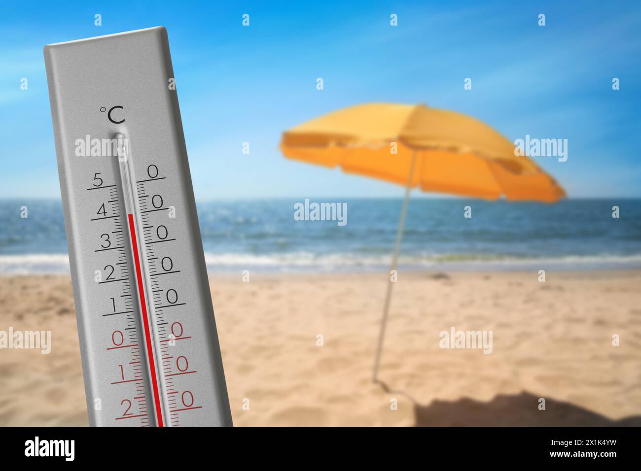 Thermometer on beach showing temperature, summer weather Stock Photo ...