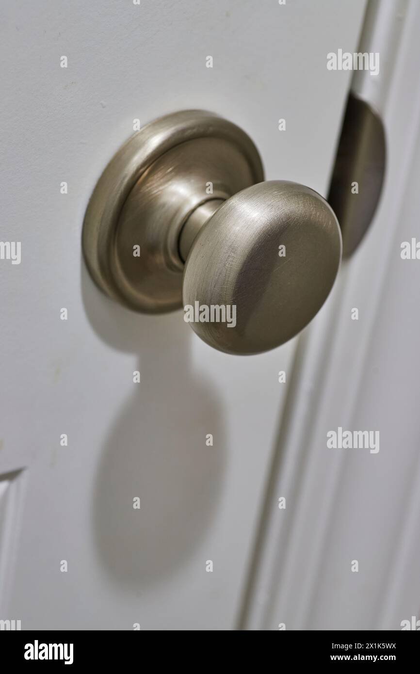 Brushed Metal Doorknob Detail on White Door - Macro Perspective Stock ...