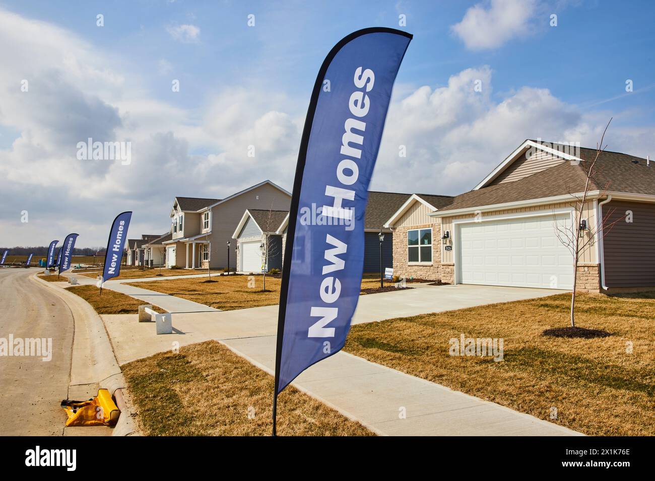 New Homes Banners in Suburban Development, Eye-Level View Stock Photo ...