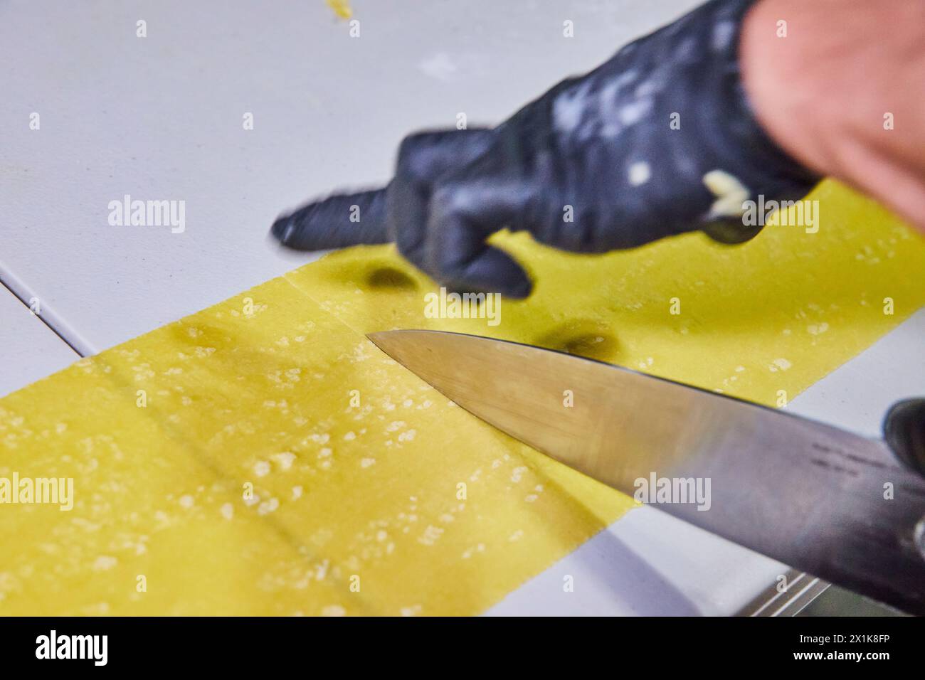 Chef's Hands Shaping Homemade Pasta Dough in Action Stock Photo - Alamy
