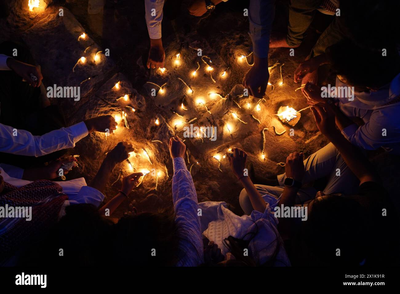Iraqi Yazidis light candles at Lalish mountain valley and temple near ...