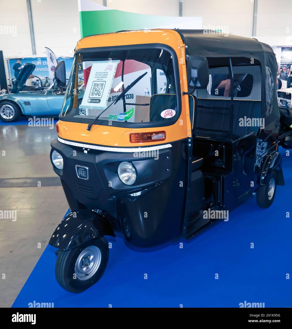 Three-quarters front view of a Bajas RE 45 Tuk Tuk, on display at the ...